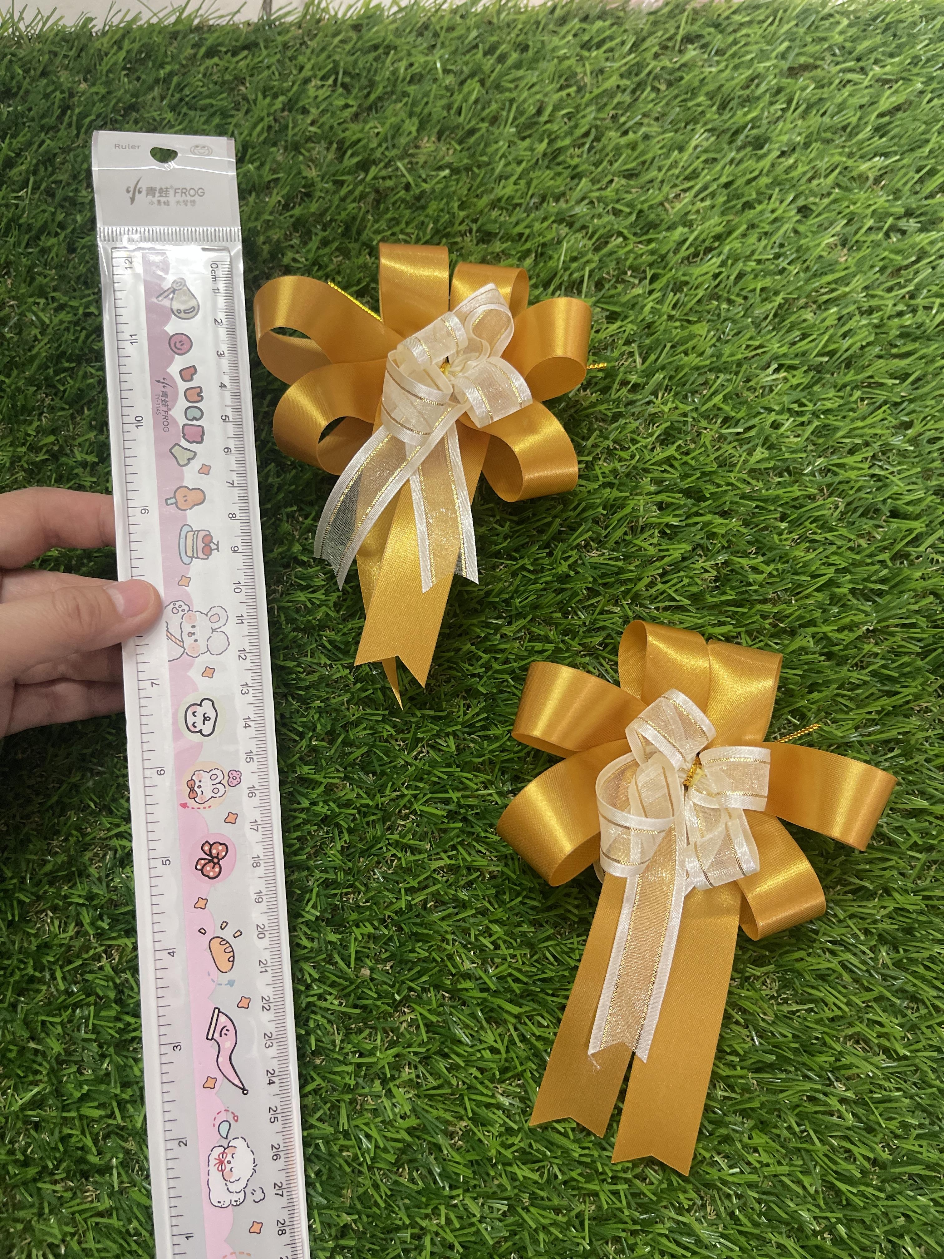 โบว์สำเร็จสืทอง B2 #11669-7C-205(ราคา/10 ดอก)